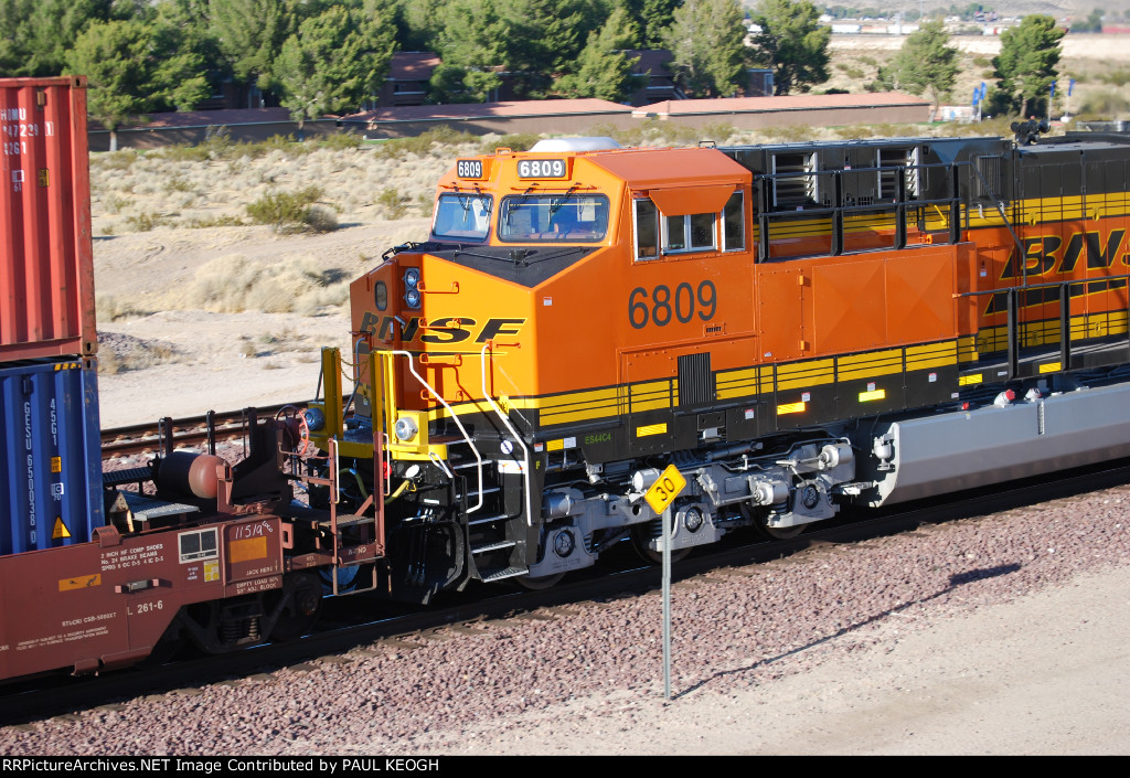 BNSF 6809 as the sun reflects off her Very Brand New Swoosh Logo Paint heads into the yard.